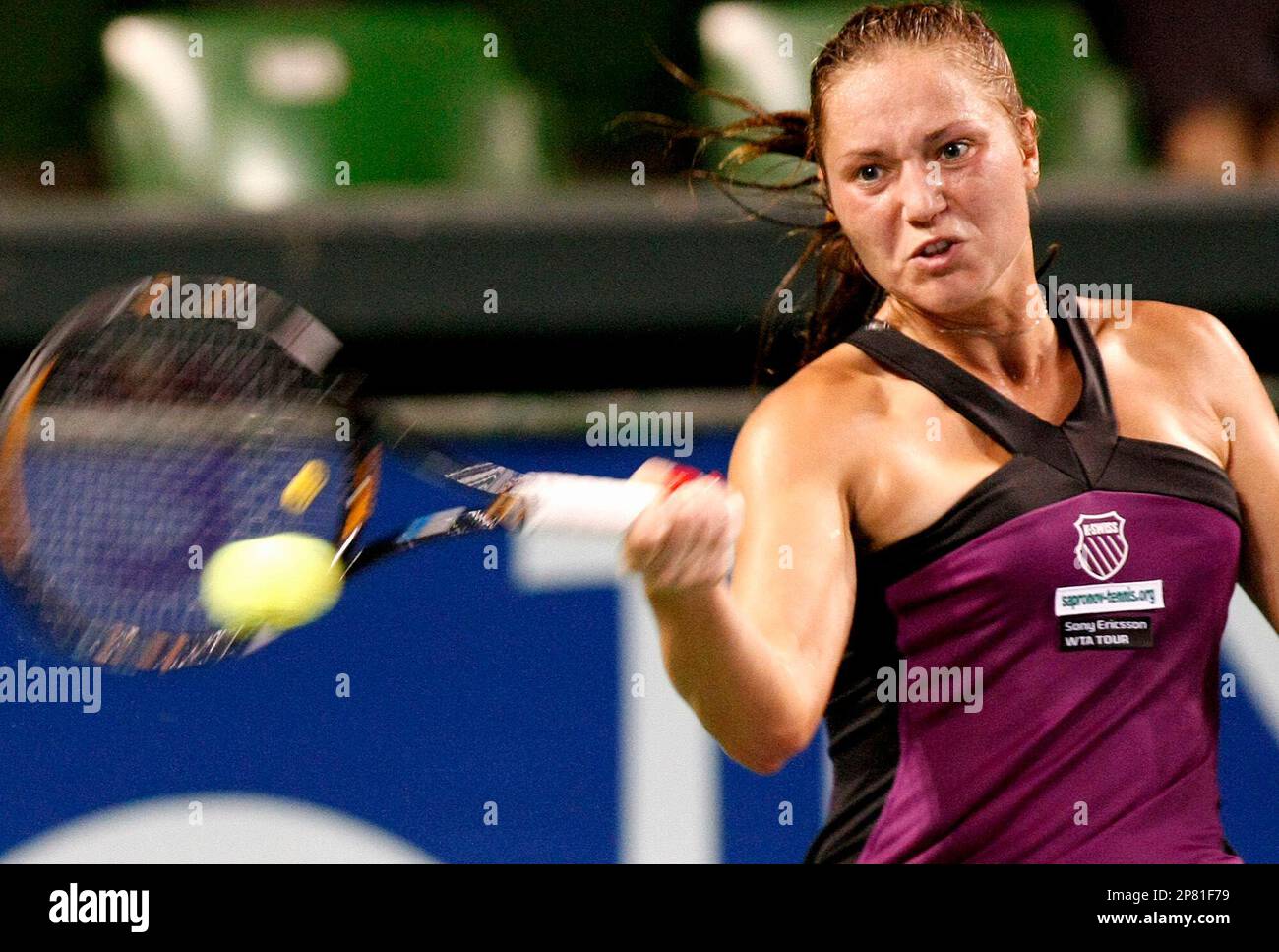 Ukraine's Kateryna Bodarenko makes a forehand return to Russia's Elena ...