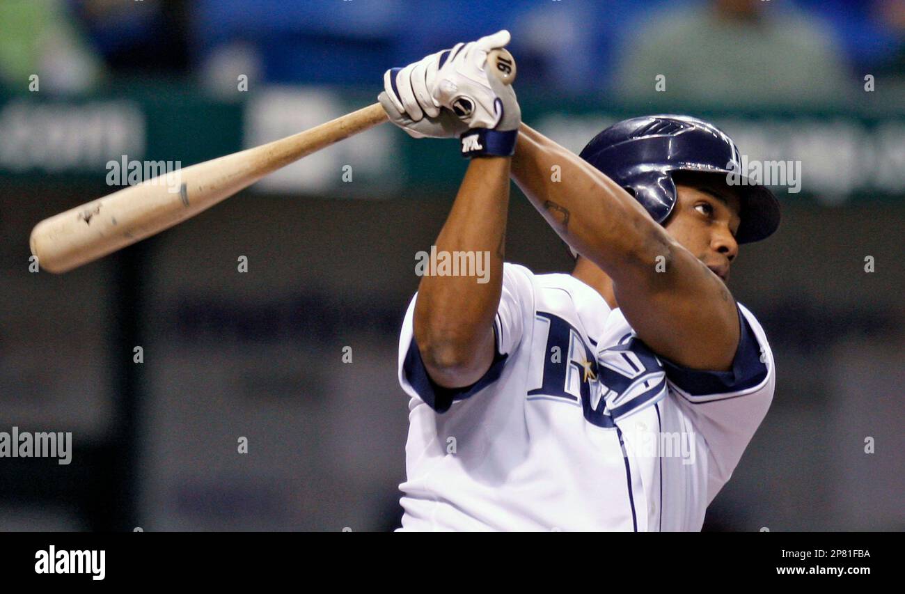 Tampa Bay Rays' Willy Aybar follows the flight of his seventh-inning ...