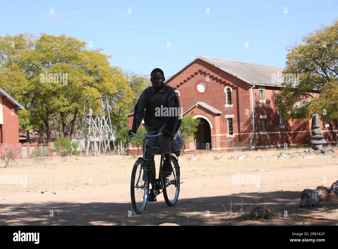 This June 29, 2009 photo shows a man cycling in front of the hall at ...