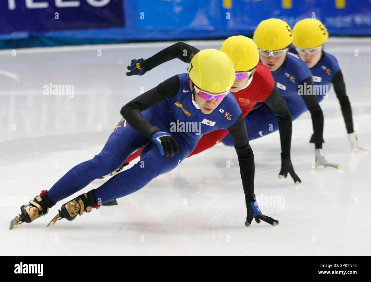 Cho Ha-ri of South Korea, left, skates ahead Wang Meng of the China ...