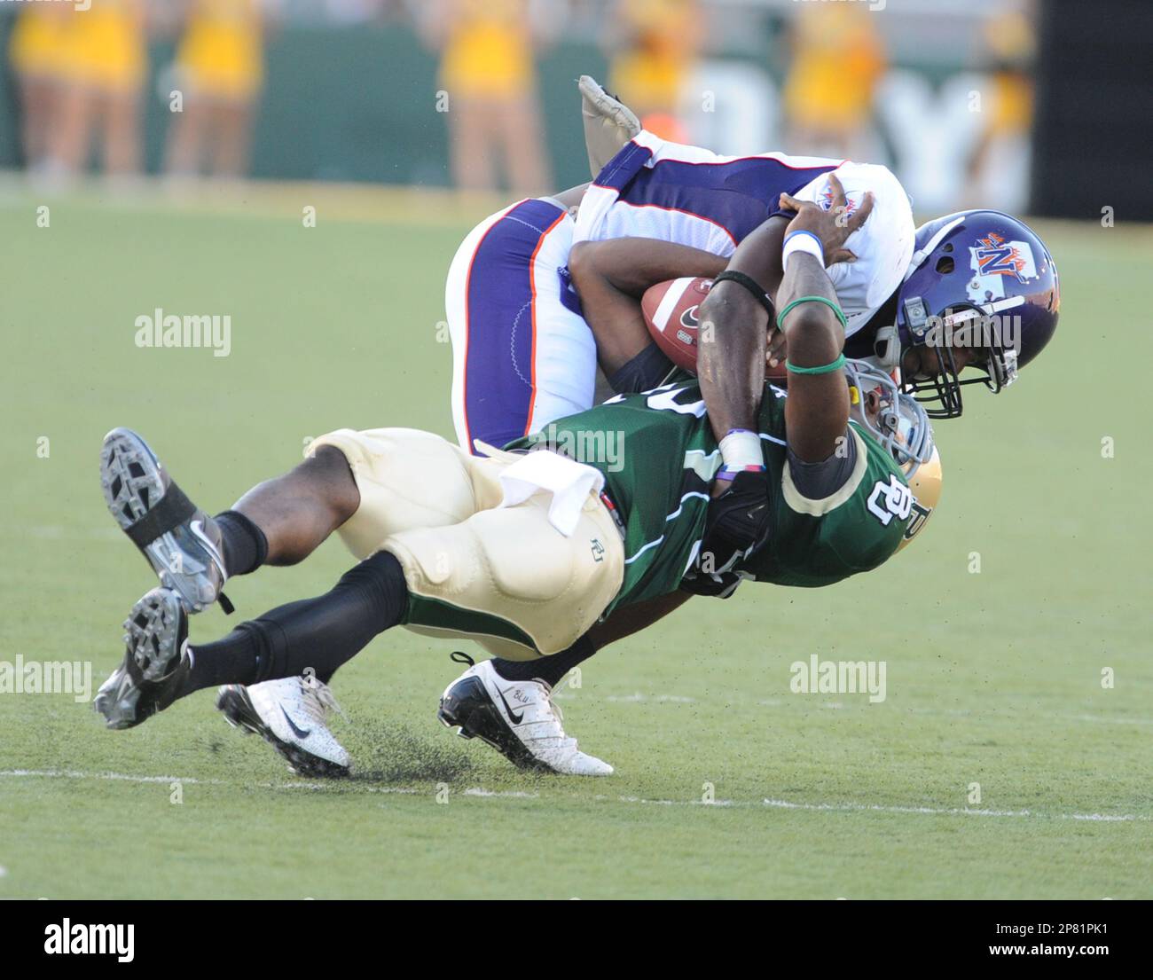 Northwestern State's Gary Riggs (2) sacks Baylor quarterback Robert ...
