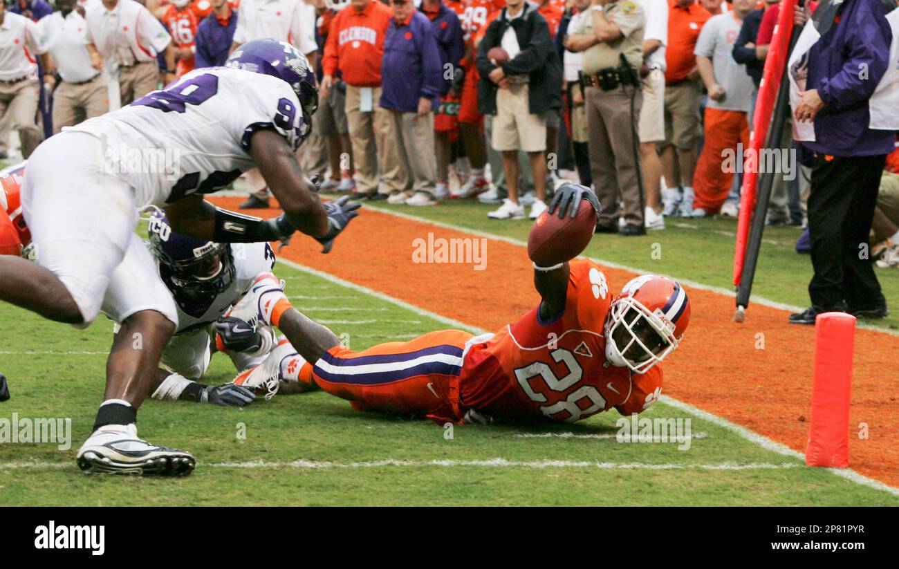 Clemson's CJ Spiller (28) falls short of the touchdown as TCU's Tejay ...