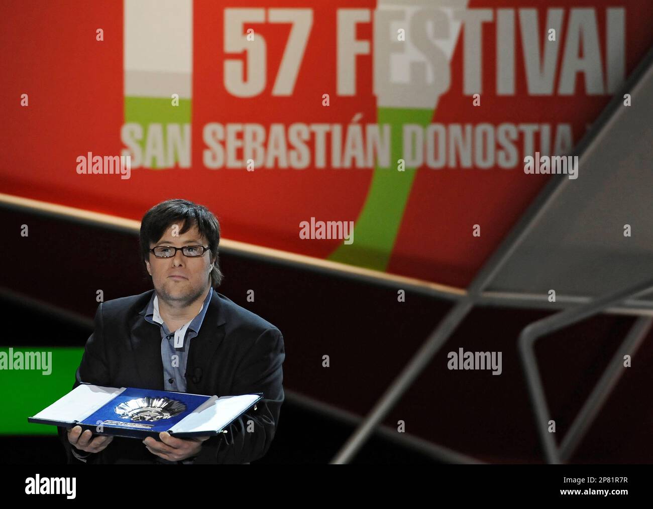 Spanish actor, Pablo Pineda, shows the Silver Shell award for best ...