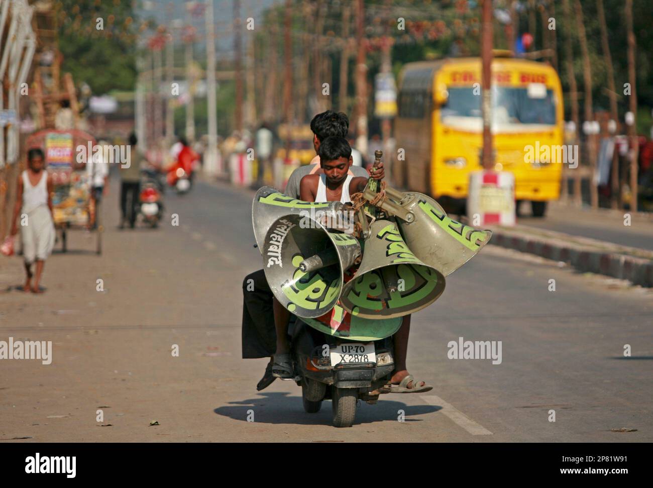 Workers transport loudspeakers during a loudspeaker competition in ...