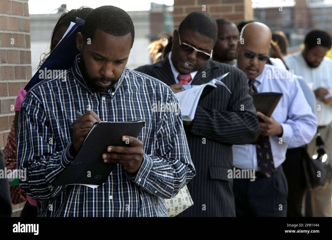 Jamal Randle, from left, Loren Cowling, and Dave Jackson fill out ...