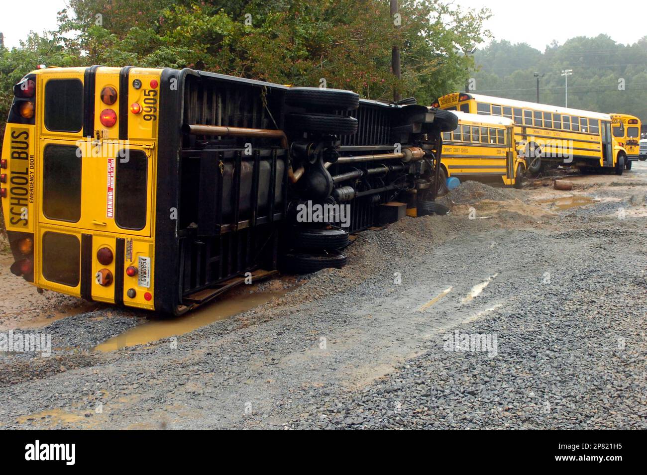 Several Gwinnett County school buses at a lot near Parkview High School ...