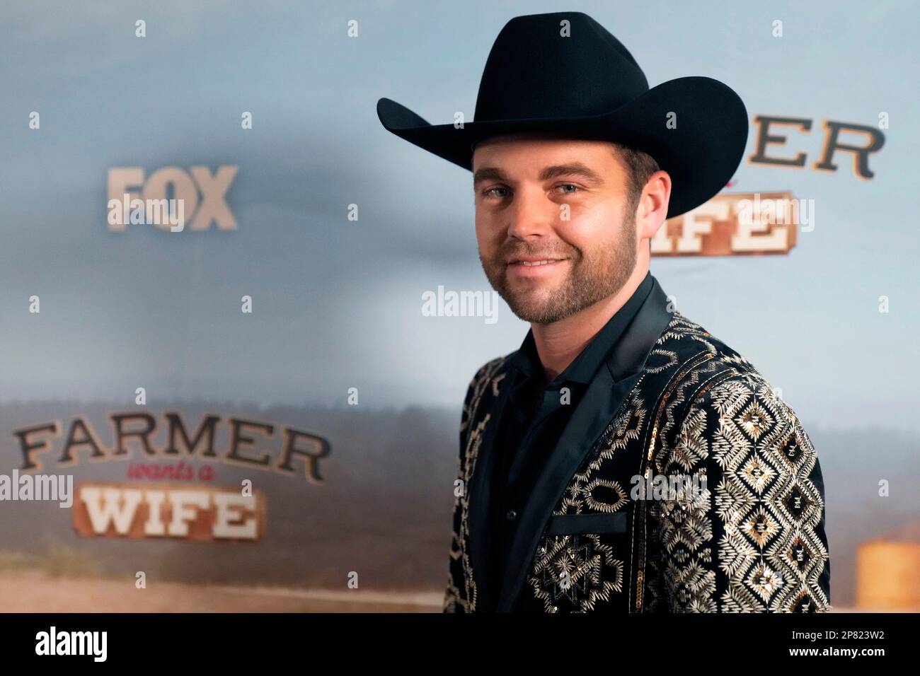 Hunter Grayson attends the premiere FOX television's "Farmer Wants a ...