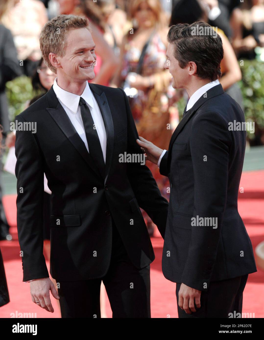 Actor Neil Patrick Harris, left, and his partner David Burtka arrive at ...