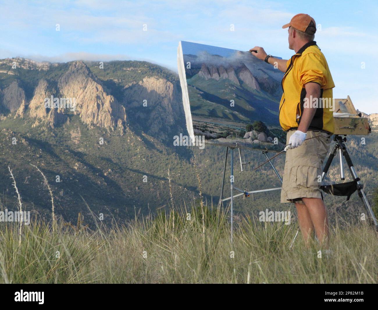 Terry Norcross paints a picture of the Sandia Mountains in Albuquerque ...