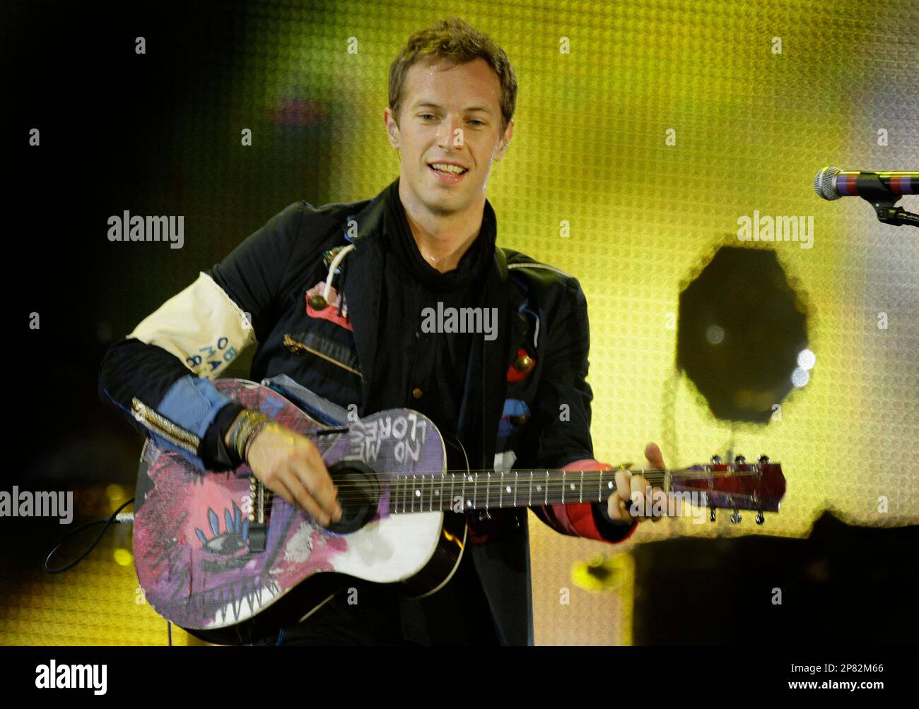 British lead singer Chris Martin, of the band Coldplay, performs at ...
