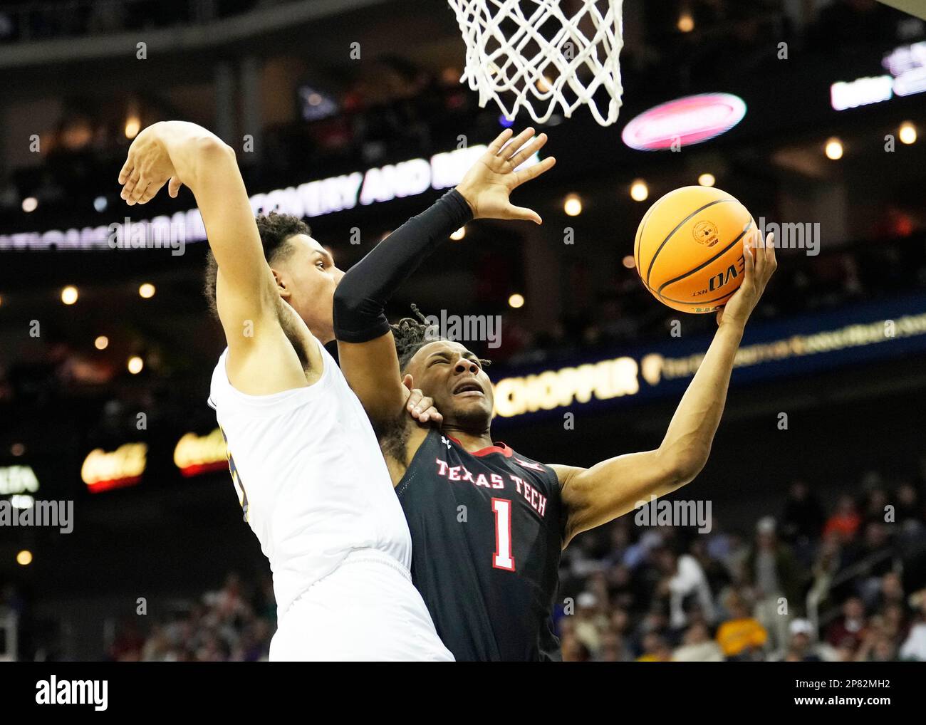 MAR 08 2023: Texas Tech guard Lamar Washington (1) drives to the basket ...