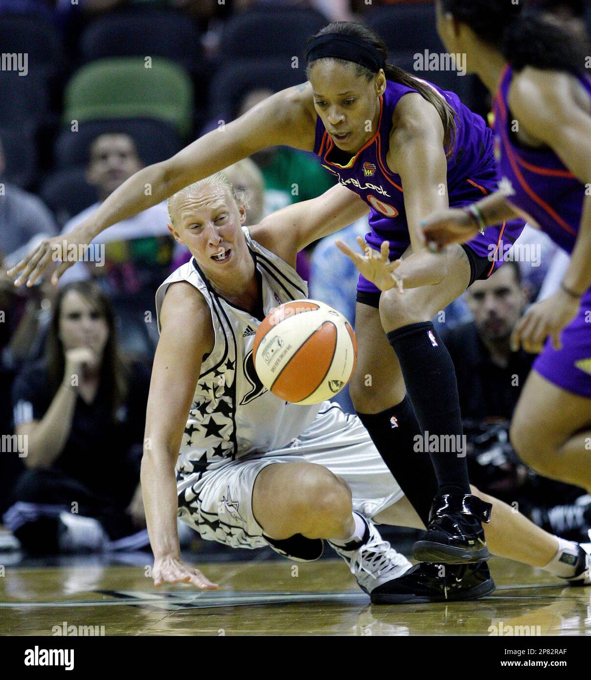 Phoenix Mercury's Tangela Smith, center, and San Antonio Silver Stars ...