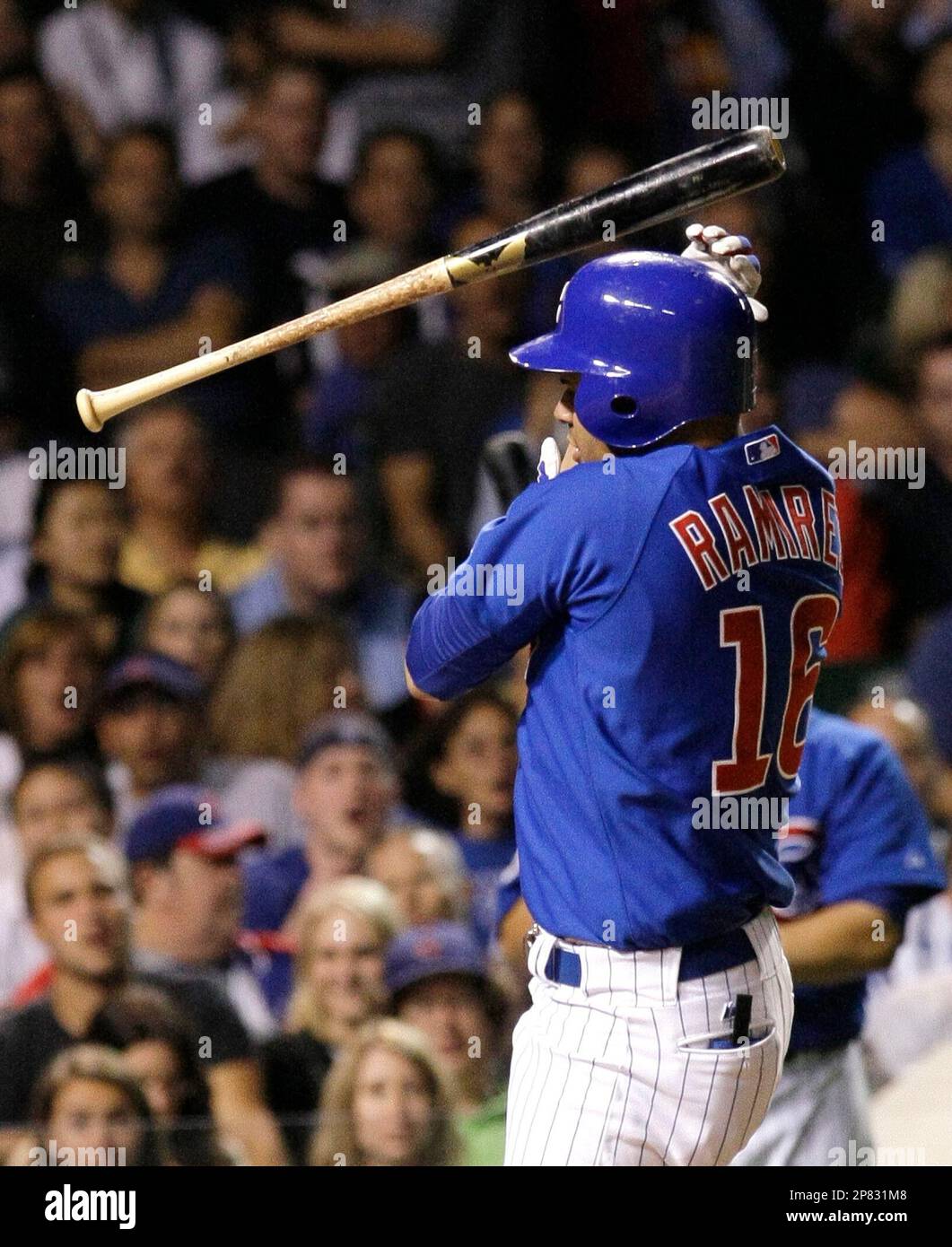 With the bases loaded, Chicago Cubs' Aramis Ramirez is hit by a pitch ...