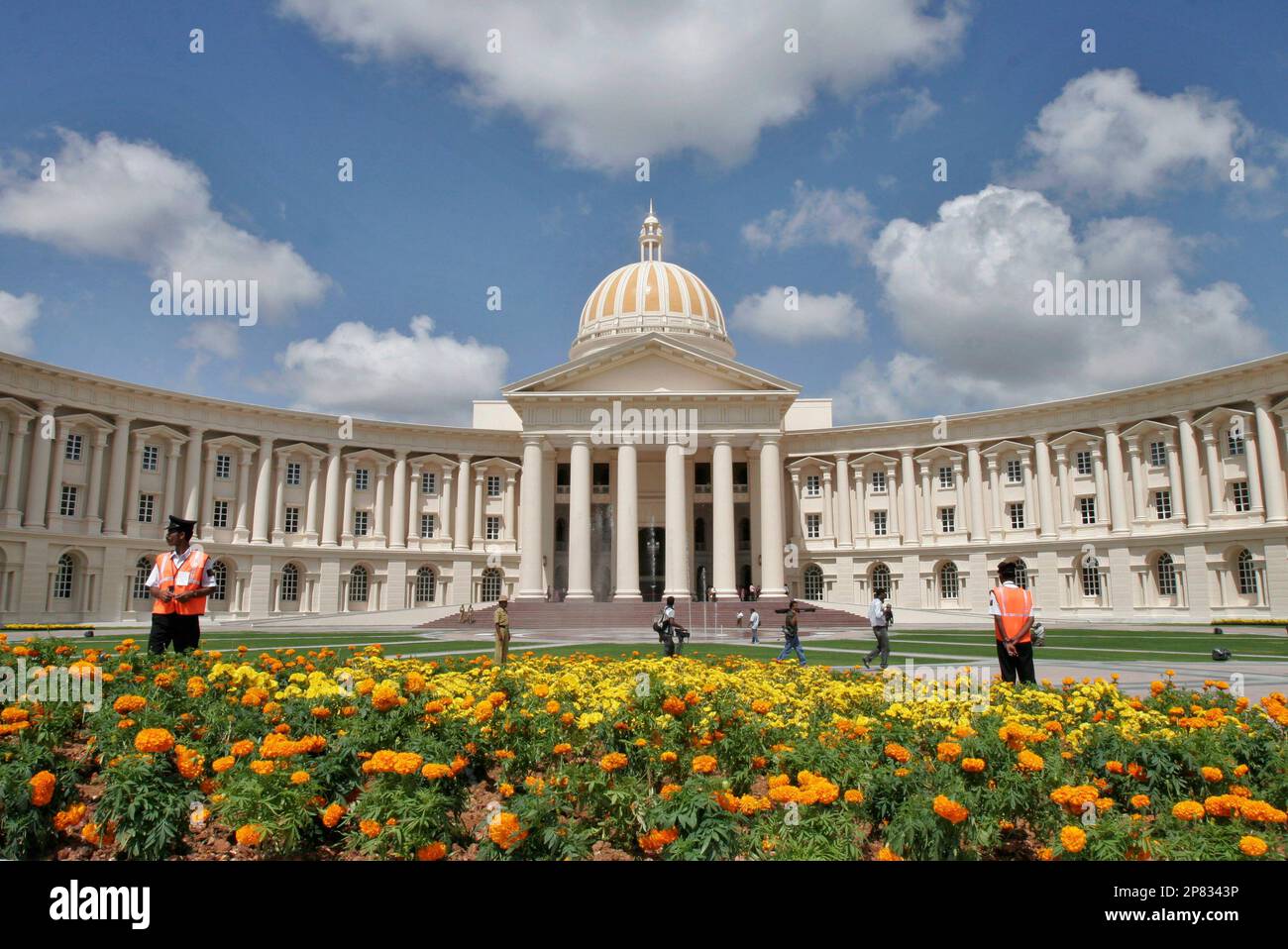 Security officials stand guard outside the Global Education Center (GEC ...