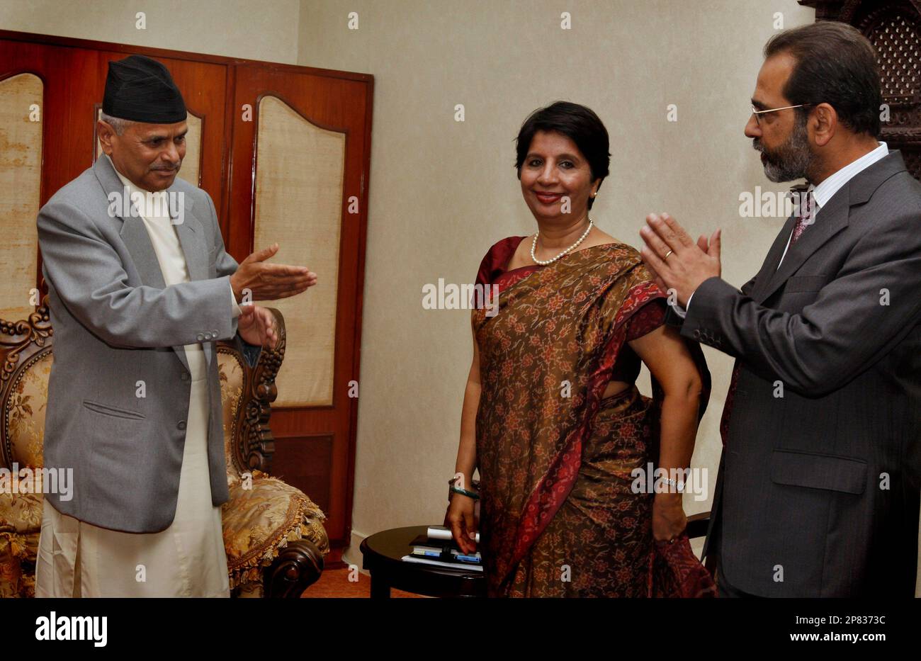 Nepalese President Ram Baran Yadav, left welcomes Indian Foreign secretary Nirupama Rao, center ...