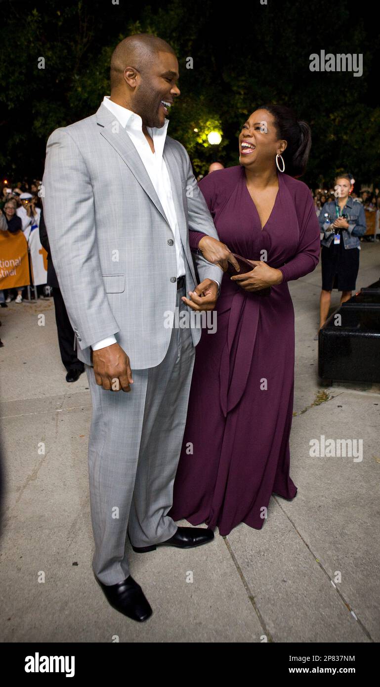 Tyler Perry, left, and Oprah Winfrey arrive to the red carpet for the ...