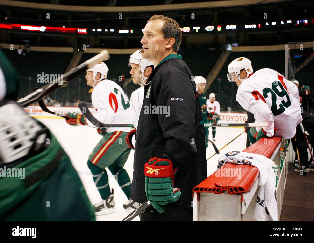 New Minnesota Wild head coach Todd Richards, center, watches his ...