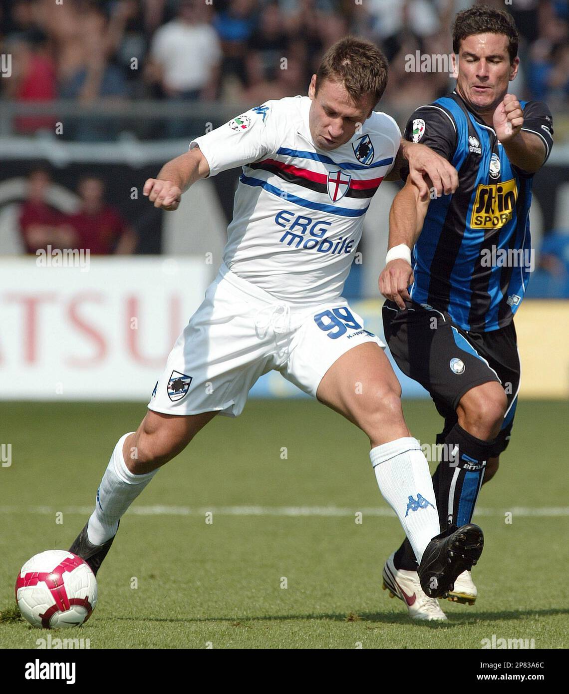Sampdoria's Antonio Cassano, left, and Atalanta's Simone Padoin ...
