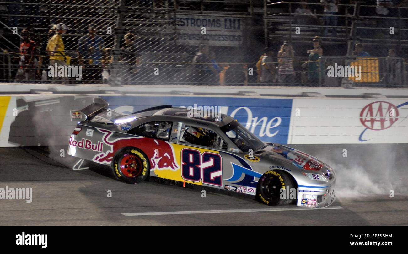 Scott Speed (82) slides down the track during the NASCAR Sprint Cup ...