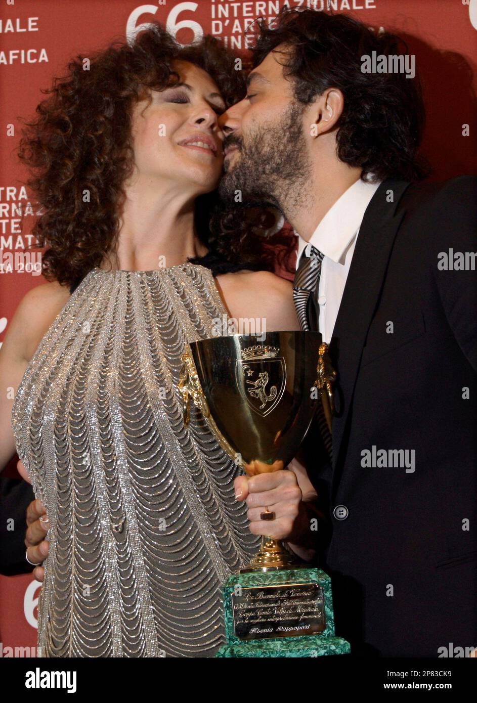 Russian born actress Ksenia Rappaport, centre, holds her Best Actress ...