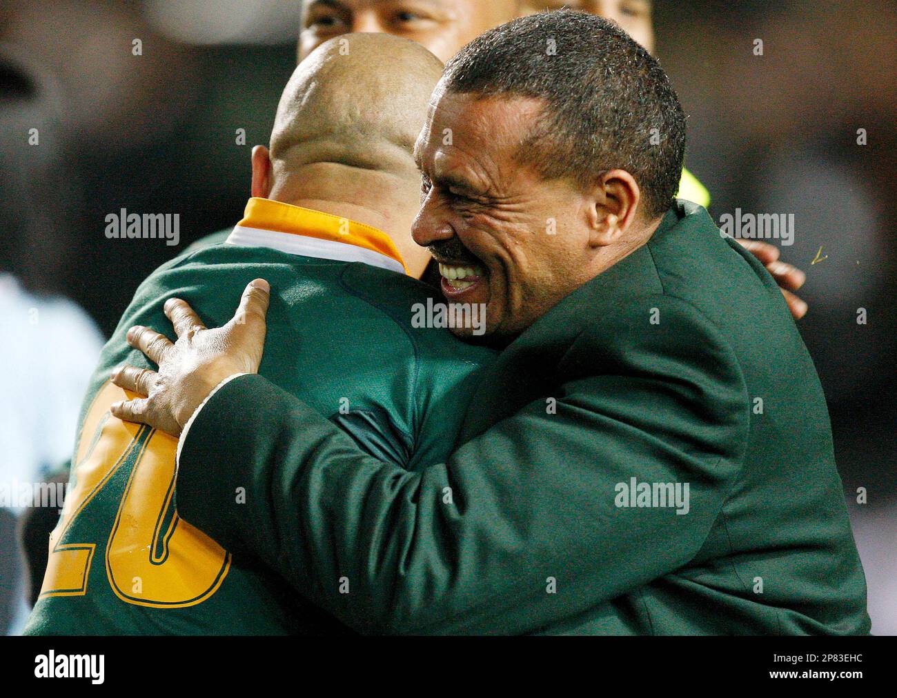 South African coach Peter de Villiers, right, congratulates Ricky ...