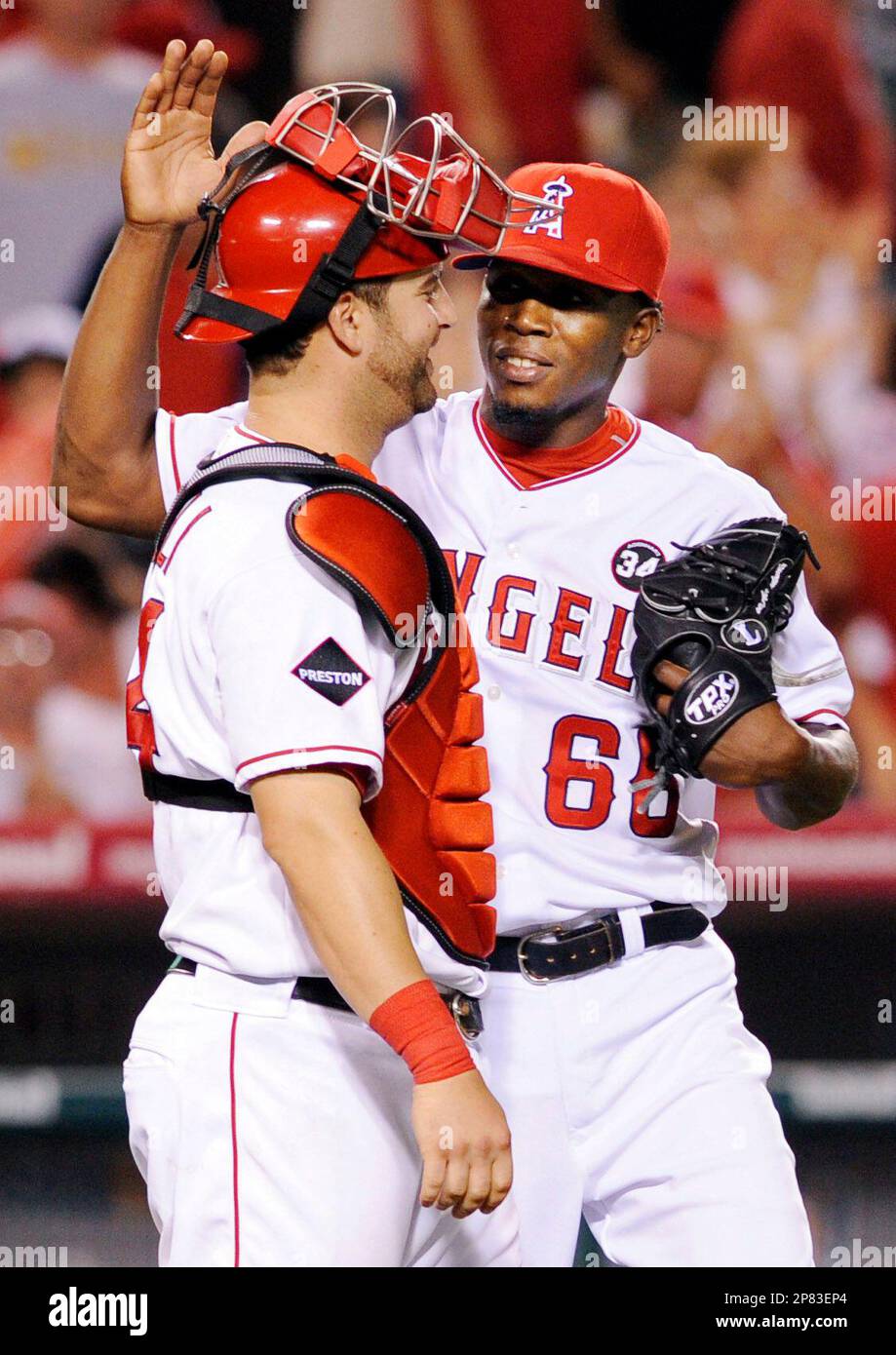 Los Angeles Angels pitcher Jose Arredondo, right, celebrates with ...