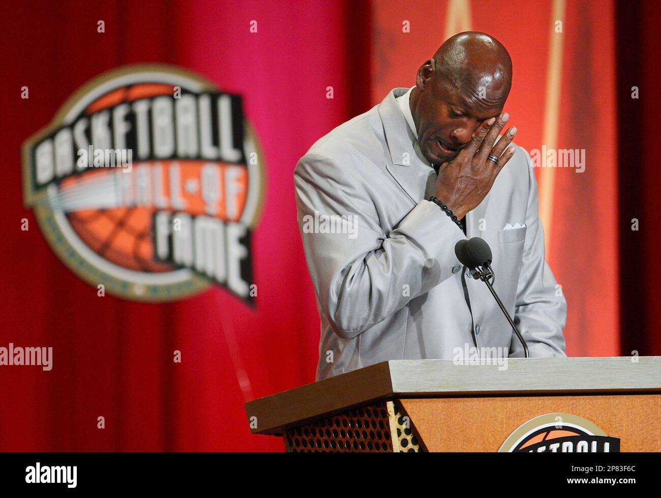 Former Chicago Bulls and Washington Wizards guard Michael Jordan wipes ...