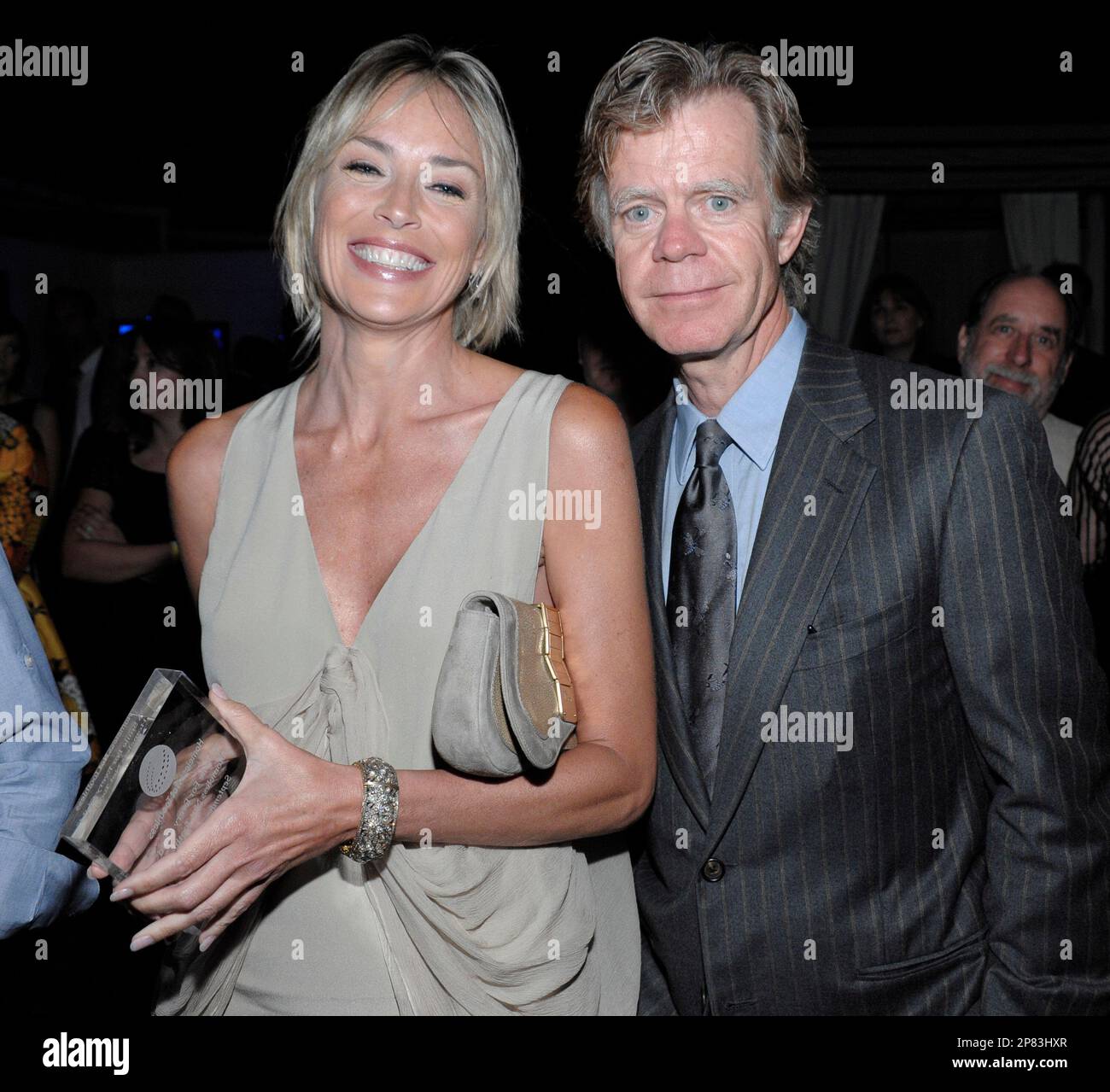 Actress Sharon Stone, left, and actor William H. Macy pose together at ...