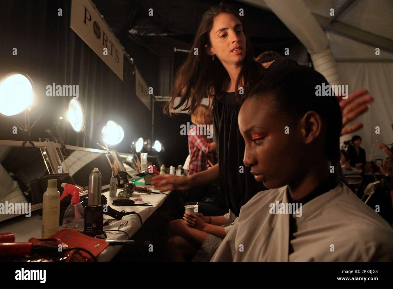 Hairstylist Isabelle Lepage prepares model Sheena Moulton from Kingston ...