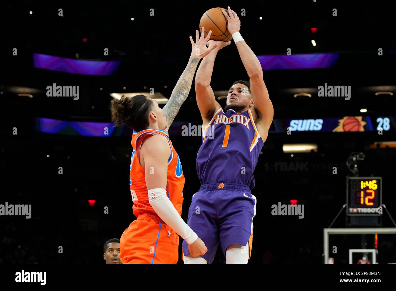 Phoenix Suns guard Devin Booker (1) shoots over Oklahoma City Thunder ...