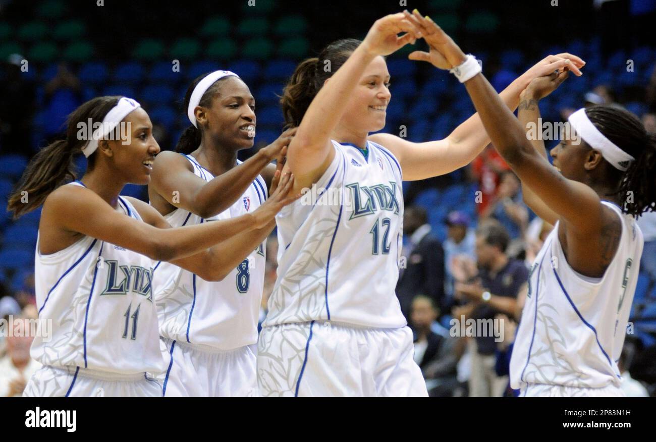 Minnesota Lynx's Candice Wiggins (11), Rashanda McCants (8), Anna ...