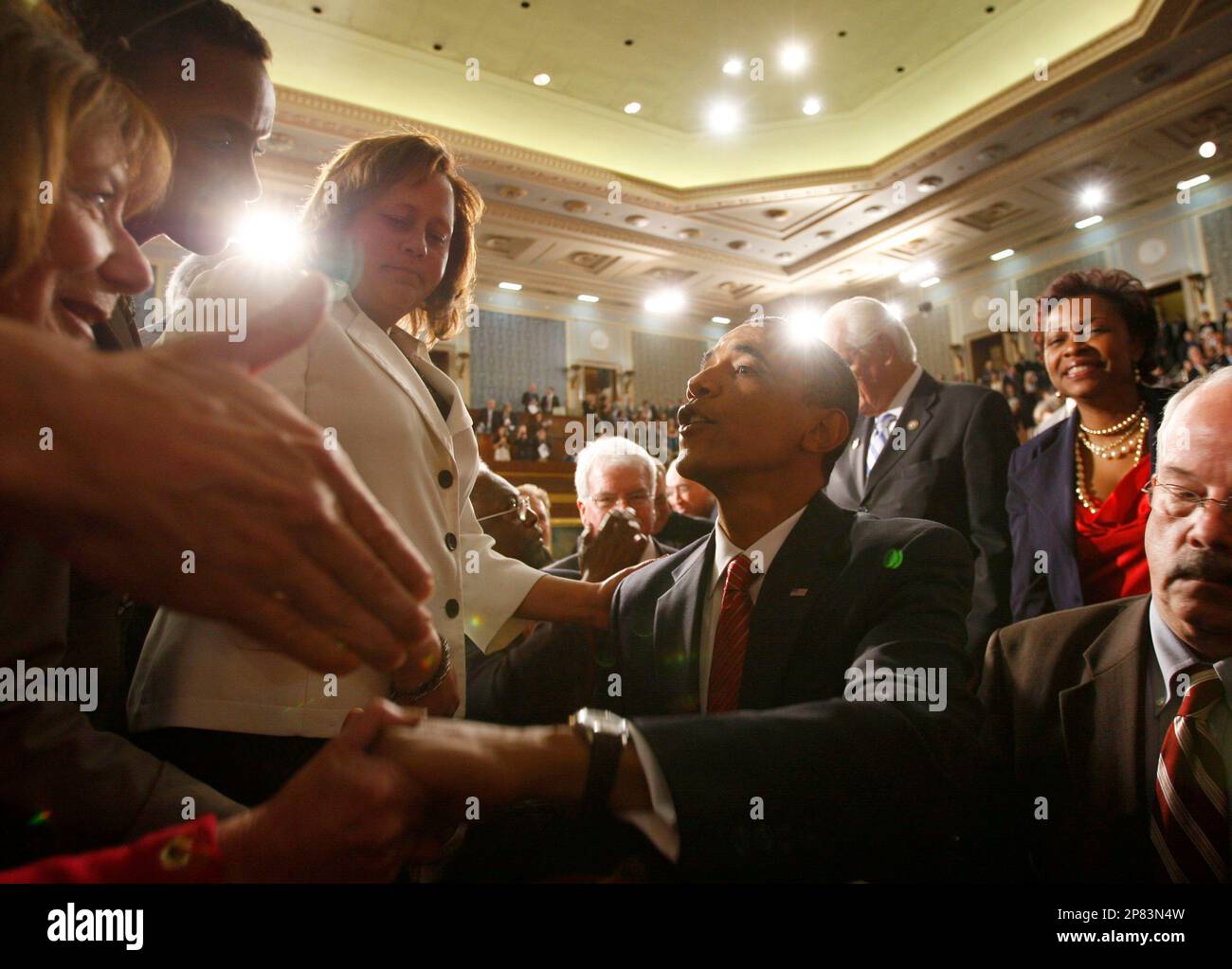 President Barack Obama shakes hands after speaking to a joint session ...