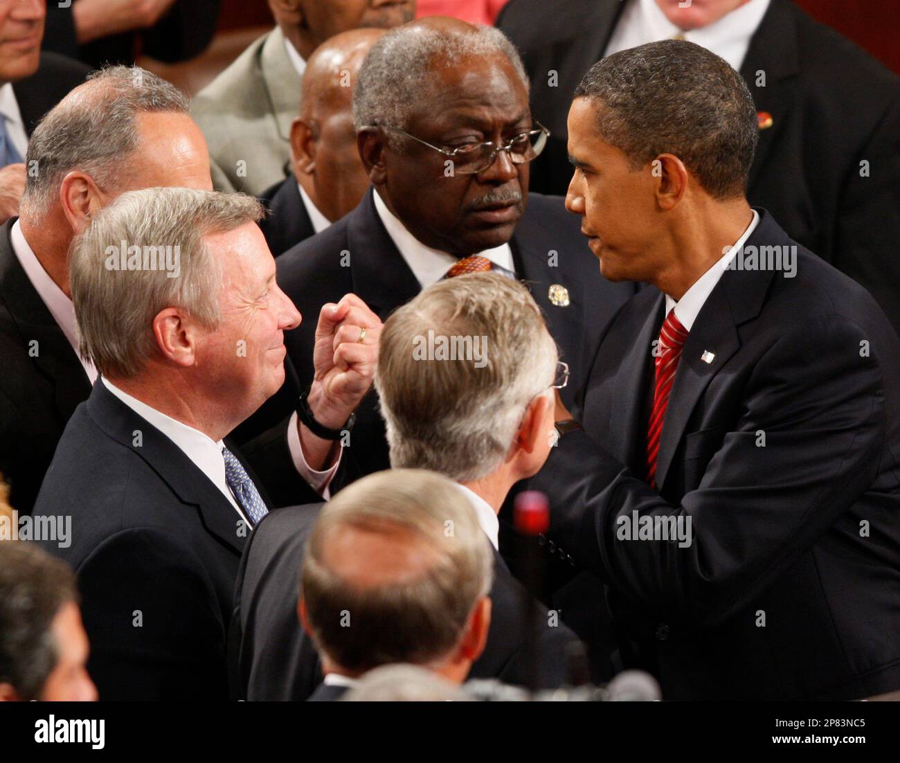 President Barack Obama is greeted on Capitol Hill in Washington ...