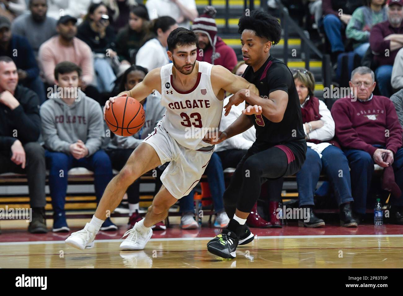 Colgate guard Oliver Lynch-Daniels, left, is defended by Lafayette ...