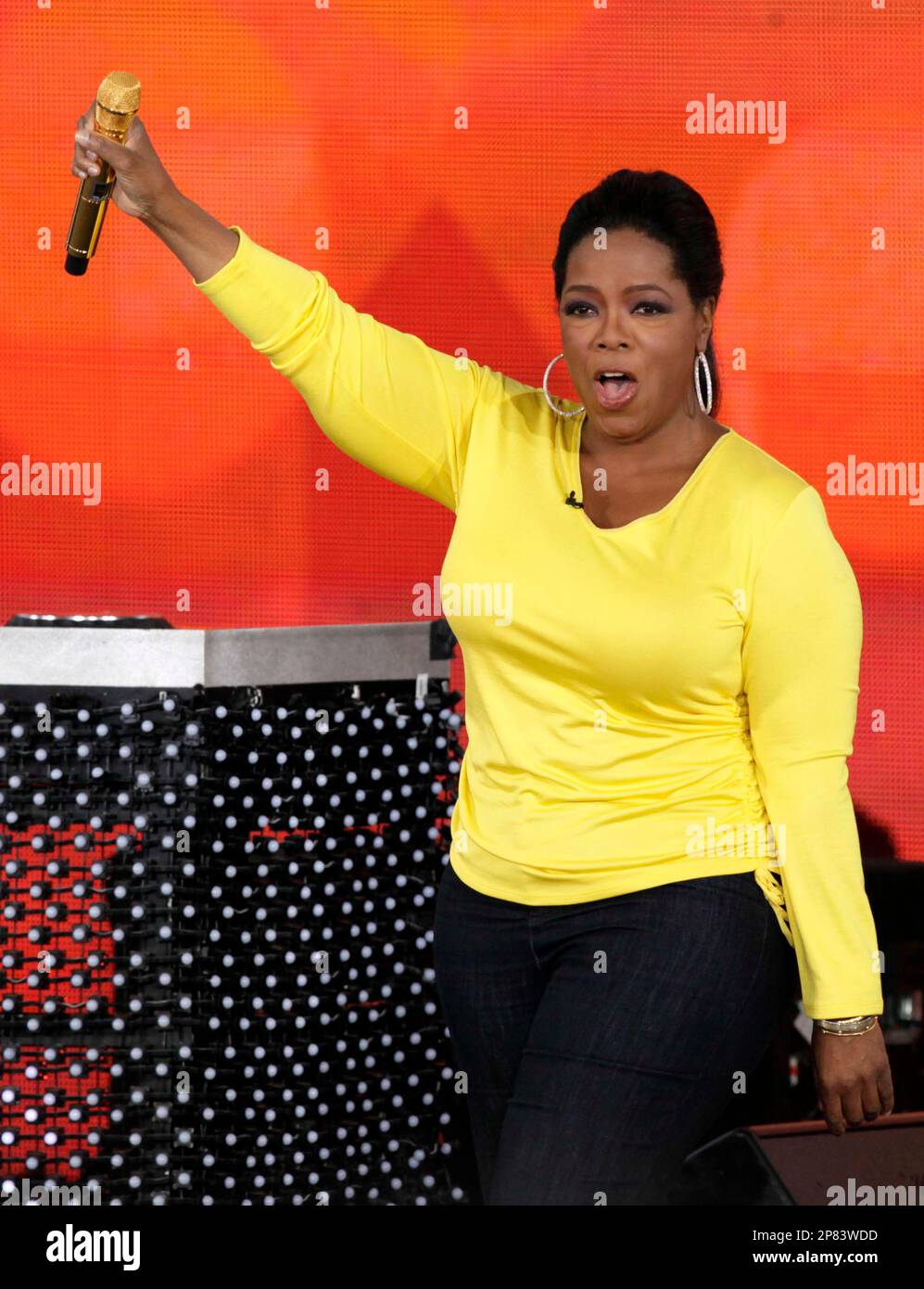 Oprah Winfrey walks on stage Tuesday, Sept. 8, 2009 in Chicago while ...