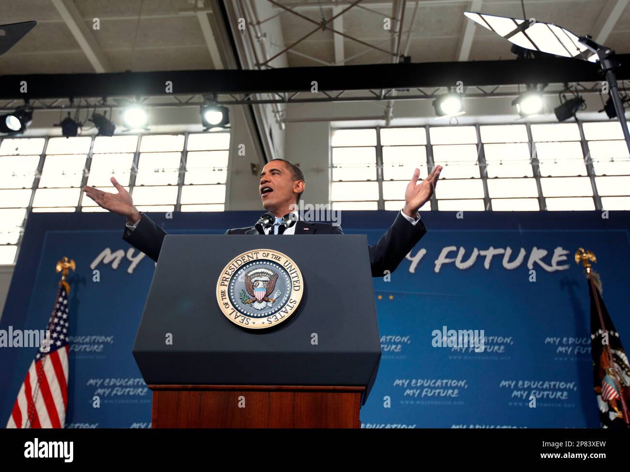 President Barack Obama gestures upon his arrival to deliver a speech on ...