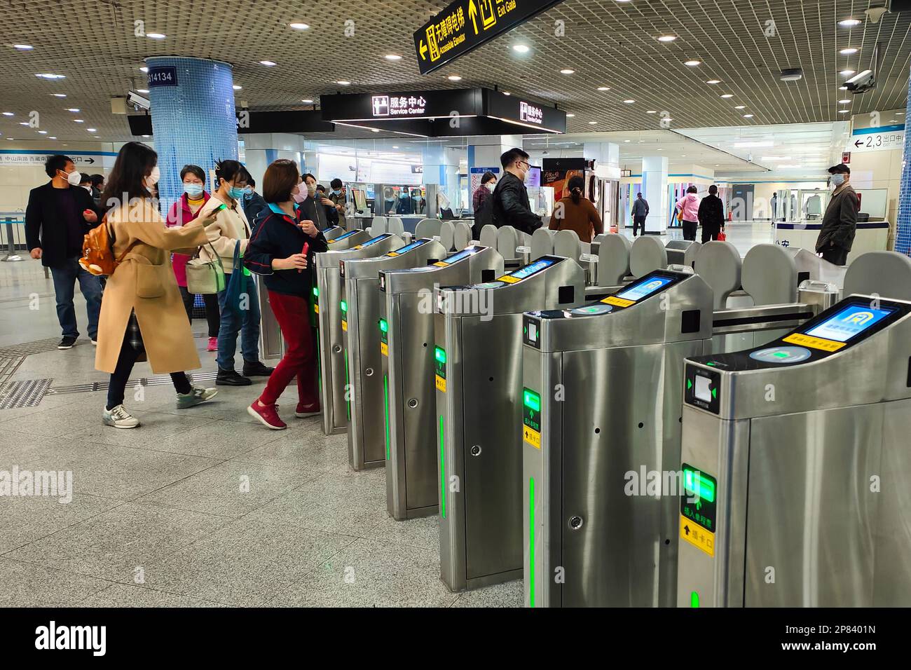 SHANGHAI, CHINA - MARCH 9, 2023 - Citizens scan codes at a subway ...