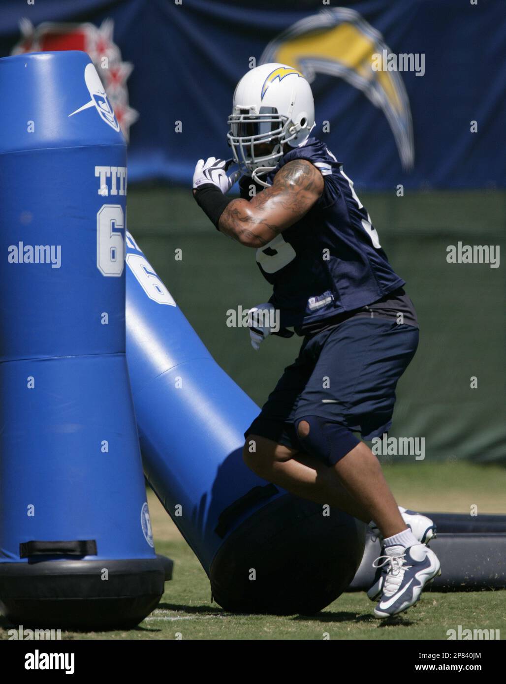 San Diego Chargers linebacker Shawne Merriman hits a blocking dummy ...