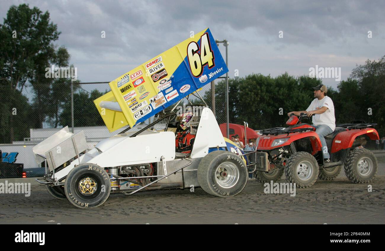 American Sprint Car Series driver Jessica Zemken is push started by ...