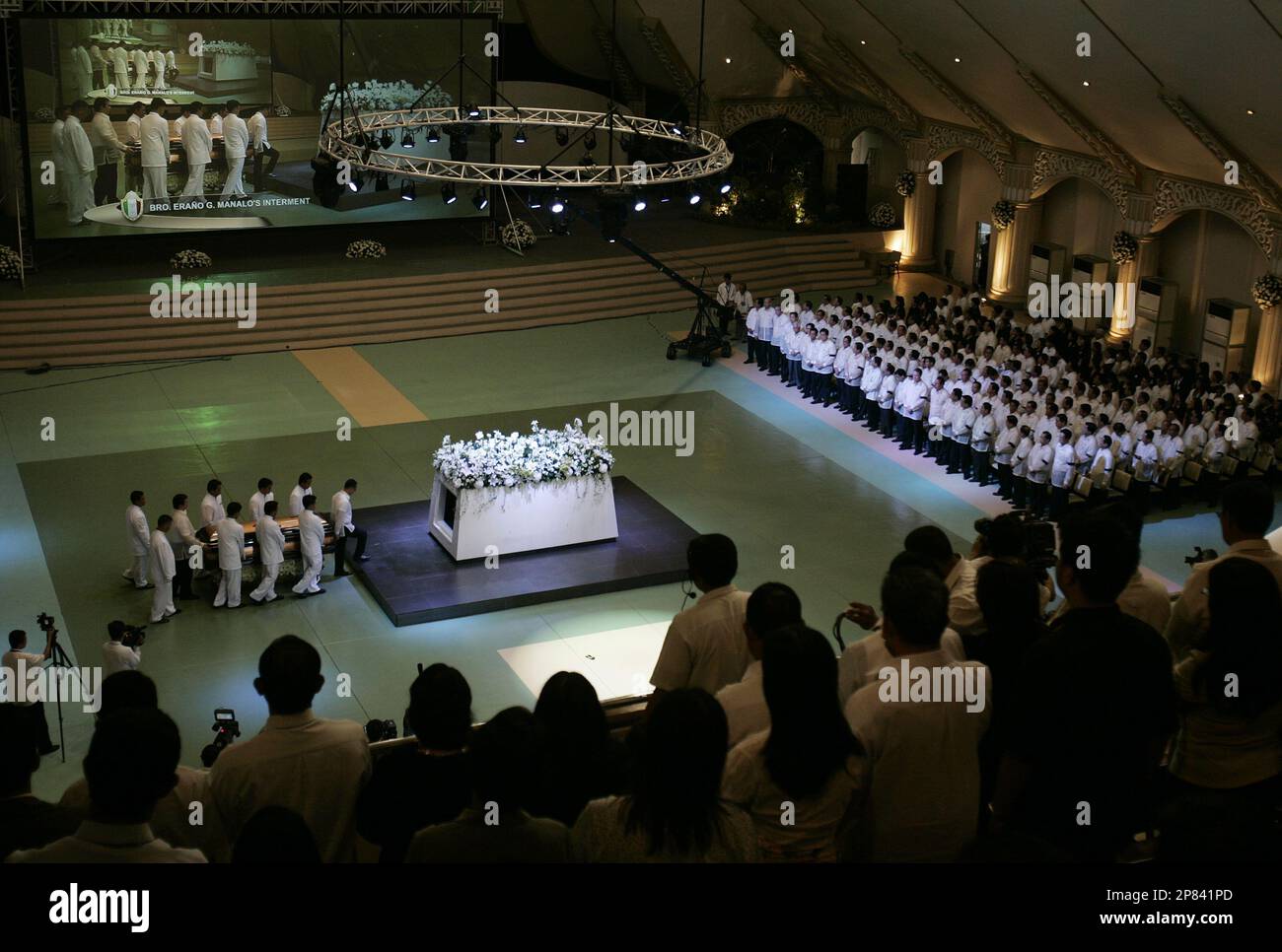 Members of the Iglesia ni Cristo, or Church of Christ, observe as their ...
