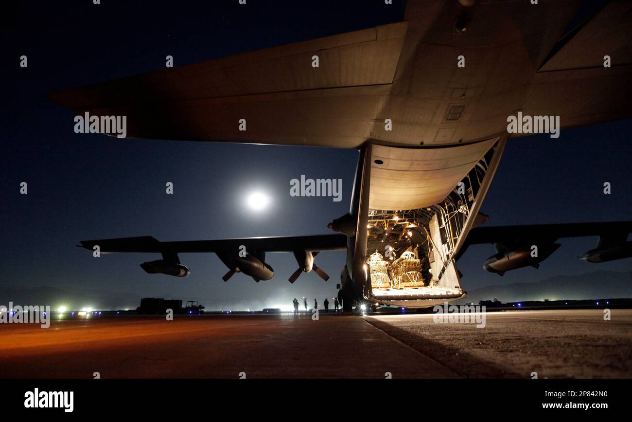 A special operations plane sits on the tarmac as it is readied to fly a ...