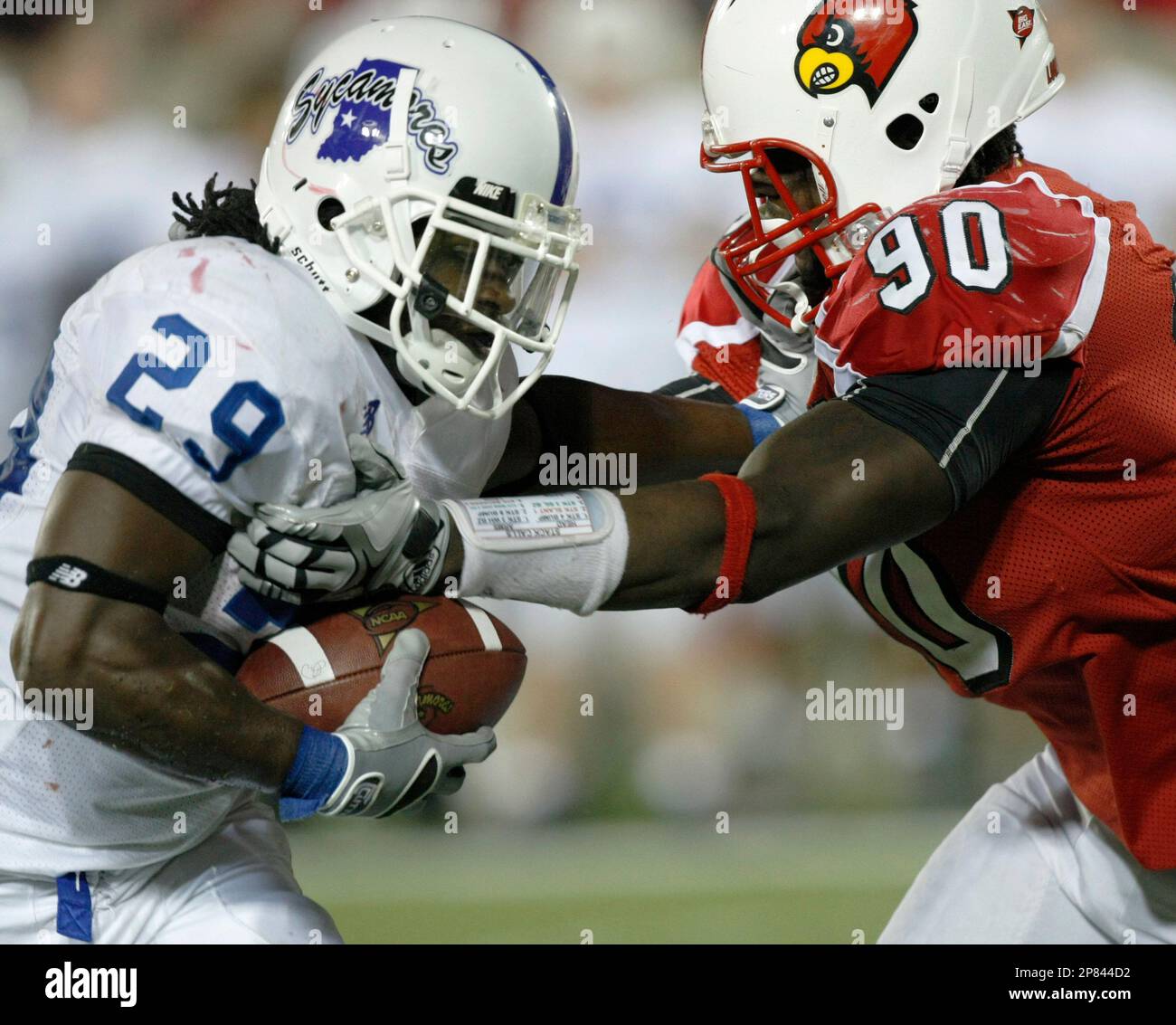 Indiana State running back Darrius Gates (29) tries to stiff-arm his ...