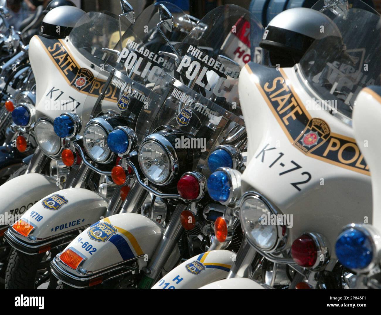 Police motorcycles line East King Street in Lancaster, Pa., following a ...