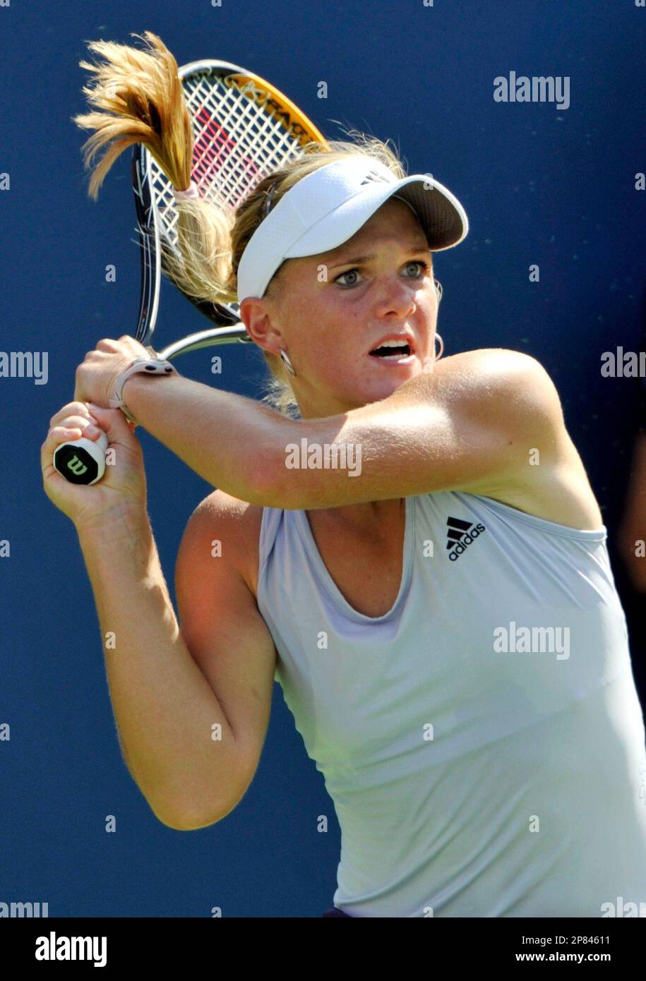 Melanie Oudin, of the United States, returns to Maria Sharapova, of ...