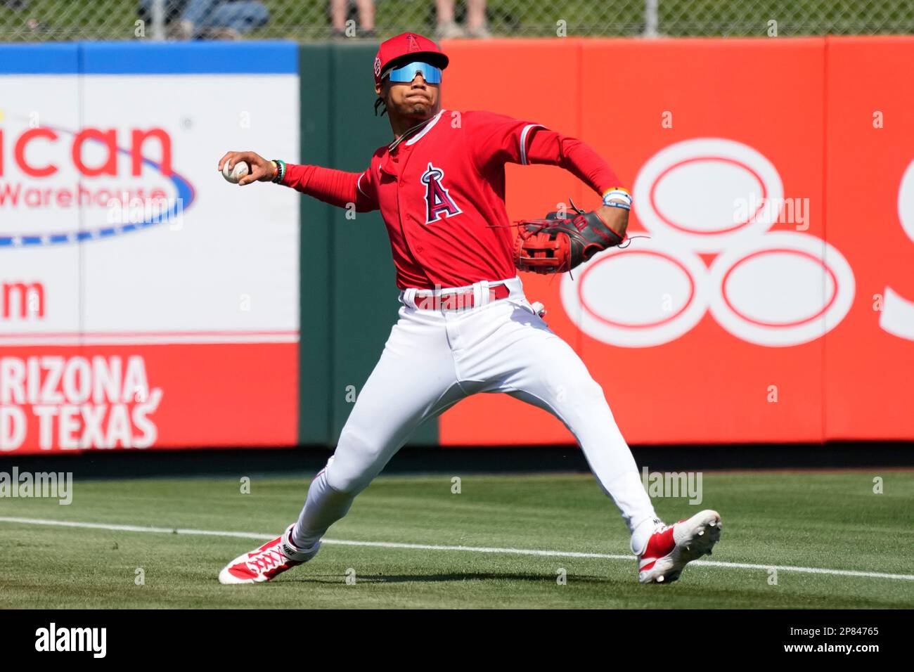 Los Angeles Angels left fielder Jordyn Adams throws the ball to seconde ...