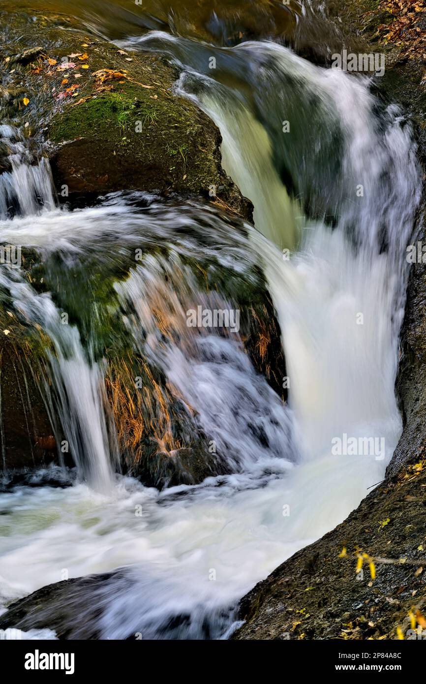 A vertical image of the waterfall in Waterford New Brunswick Canada ...
