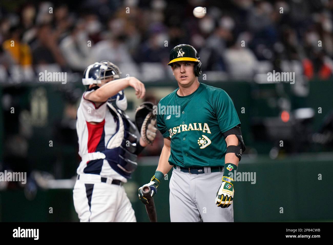 Robert Glendinning of Australia return to the bench after striking out ...