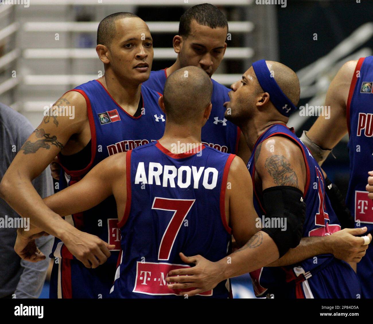Puerto Rico's players, from left, Carmelo Lee, Carlos Arroyo, front ...