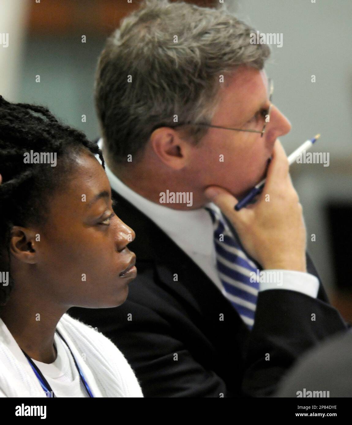 Keyonda R. Lumpkin, 28, and her attorney Kevin O'Brien listen during ...
