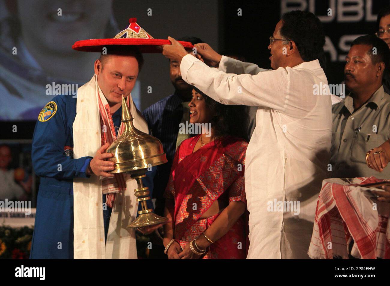 NASA astronaut Edward Michael Mike Fincke, left, is decorated with ...